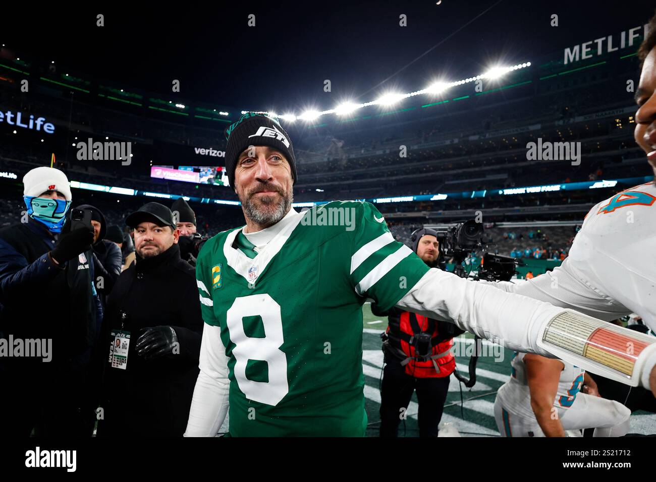 New York Jets quarterback Aaron Rodgers (8) leaves the field following ...