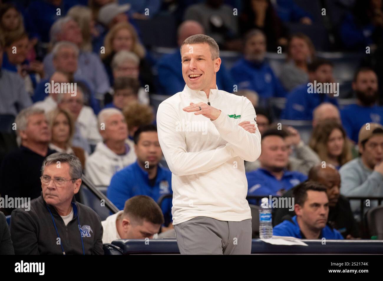 North Texas head coach Ross Hodge, center, instructs his team as they ...