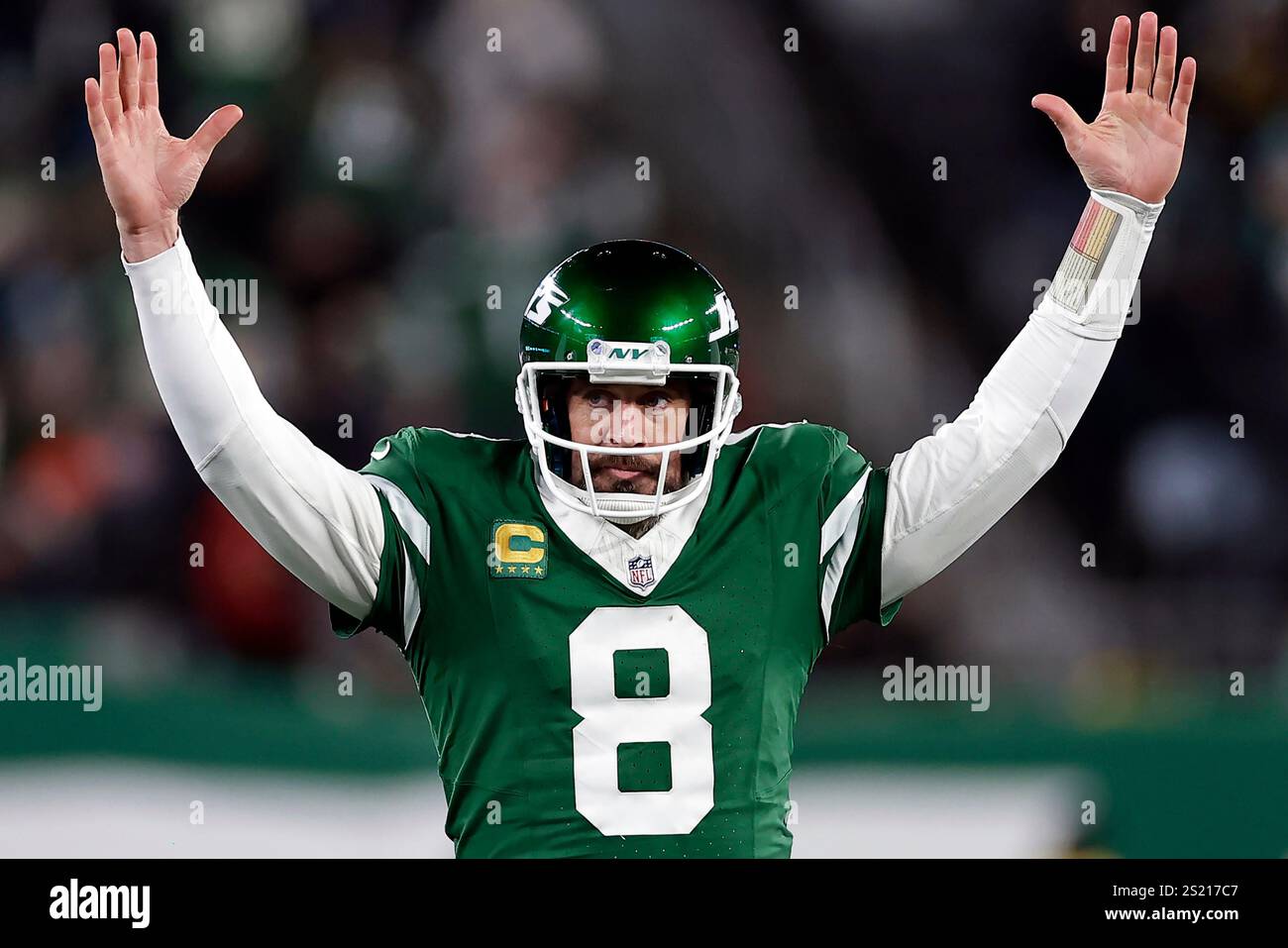 New York Jets quarterback Aaron Rodgers (8) reacts after throwing a ...