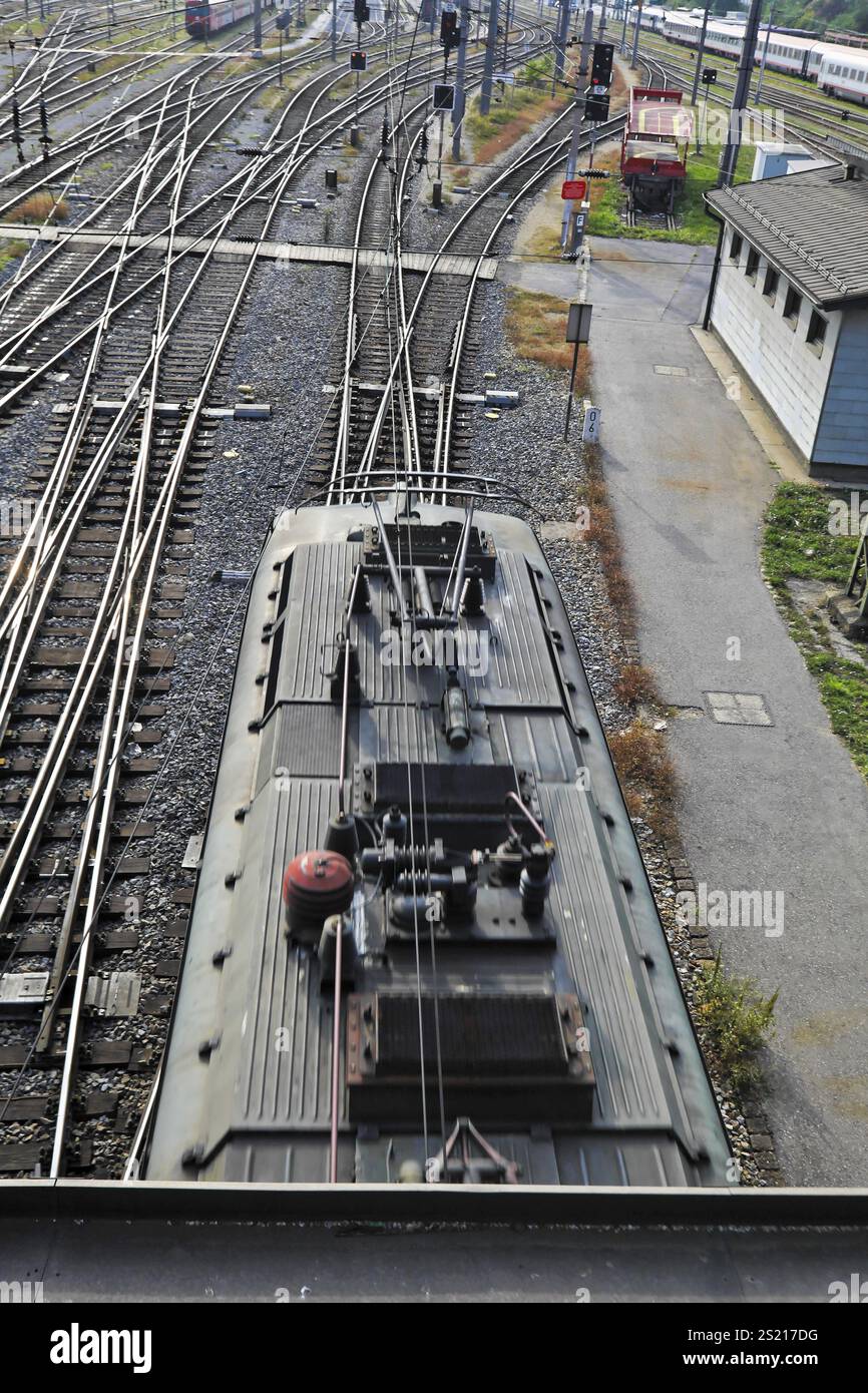 An electric locomotive runs on the tracks of a railway Austria Stock ...