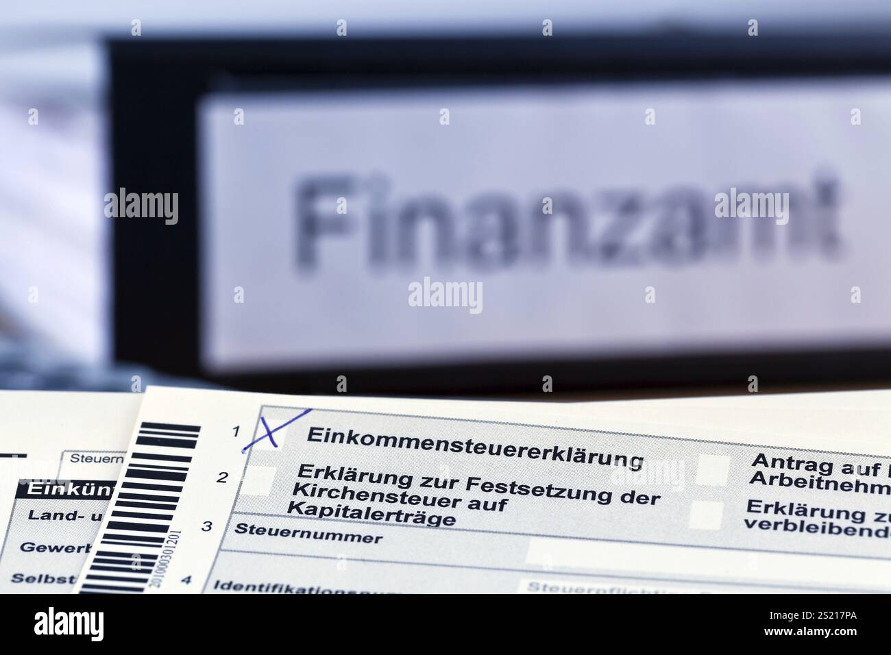 A German tax return for income tax is completed. Austria Stock Photo ...