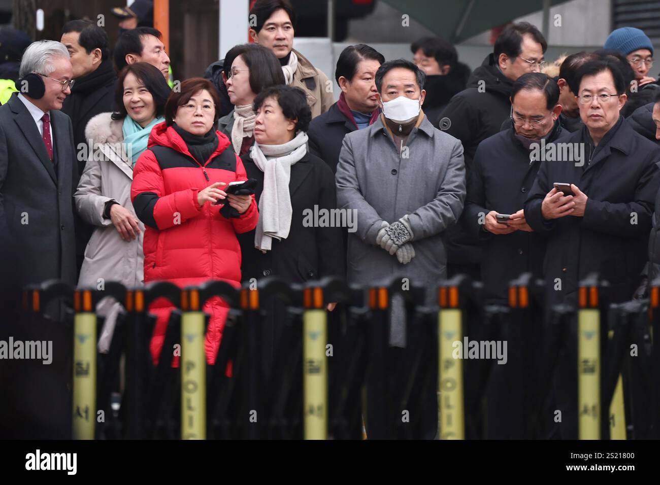Members of the ruling People Power Party wait for the arrival of ...