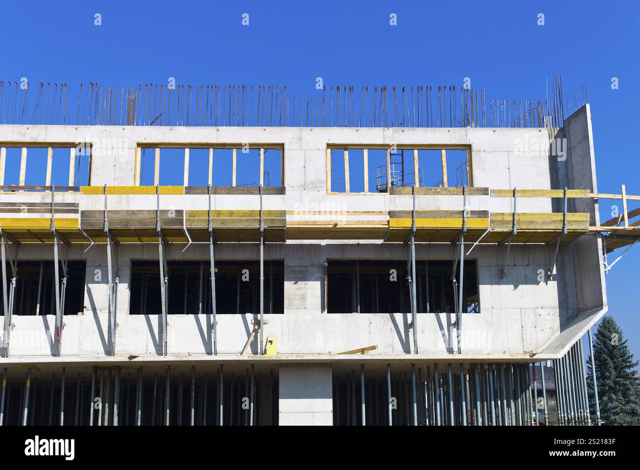 A concrete house or hall is being built. Building site. Formwork for ...