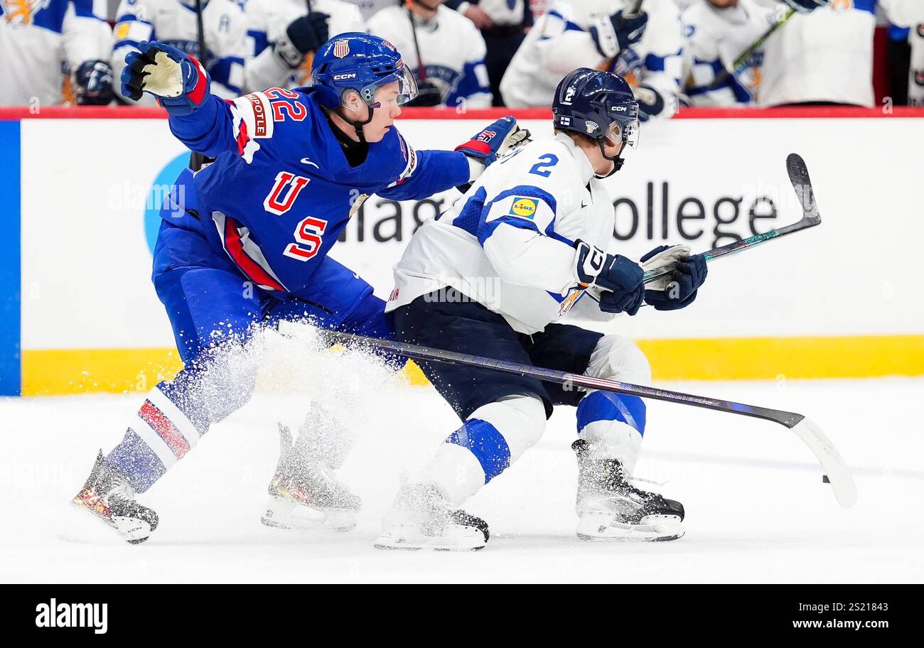 Ottawa, Canada. 05th Jan, 2025. USA forward Max Plante (22) lets go of ...