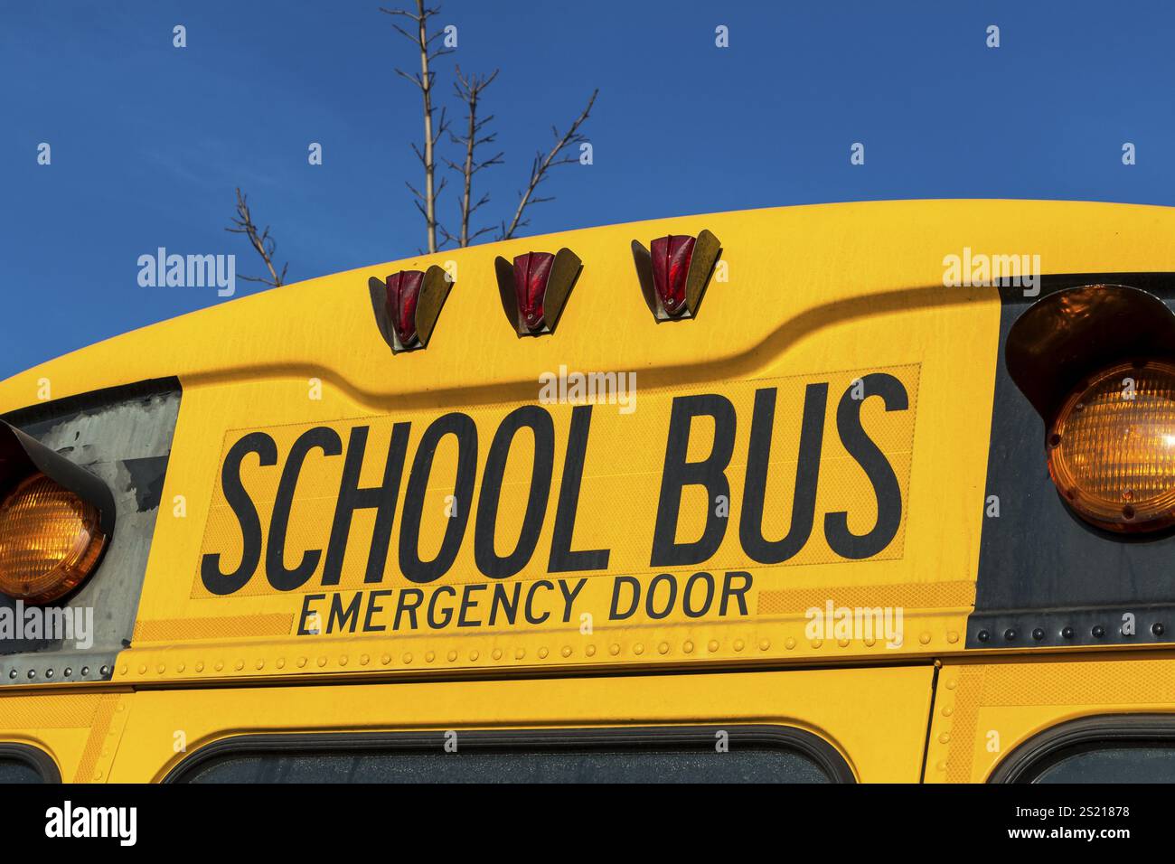 A typical american school bus in yellow colour Austria Stock Photo - Alamy