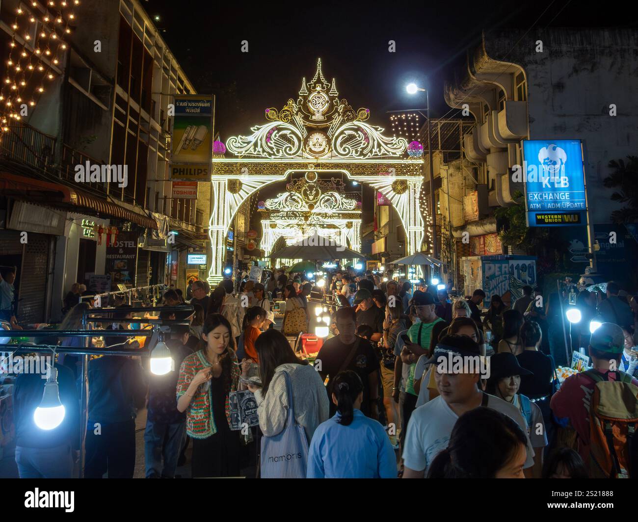 Chiang Mai, Thailand. 05th Jan, 2025. Tourists walk along Tha Phae Road ...