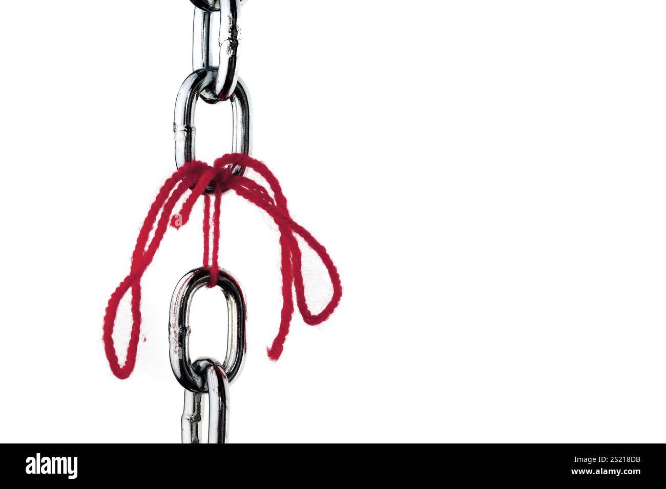 Defective steel chain is held together by a thread Austria Stock Photo ...