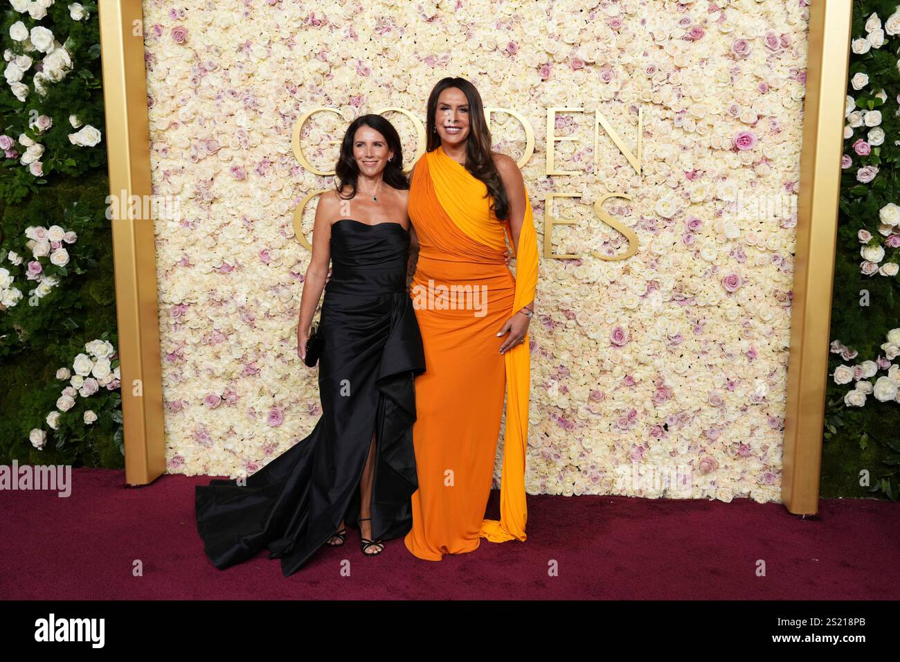 Marisa Gutierrez, left, and Karla Sofía Gascon arrive at the 82nd Golden Globes on Sunday, Jan ...