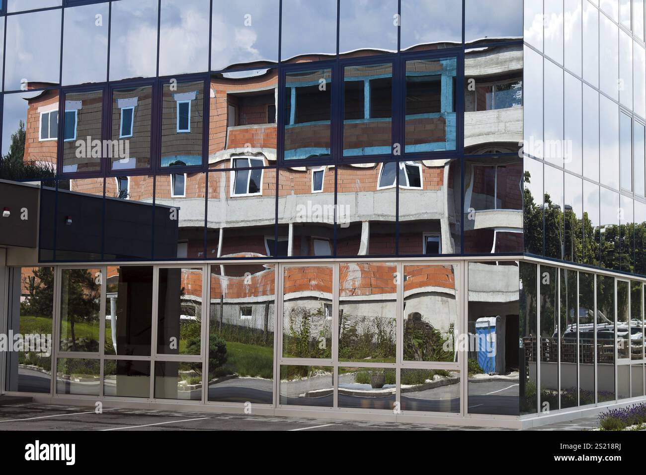 The shell of a residential building is reflected in the facade Austria ...