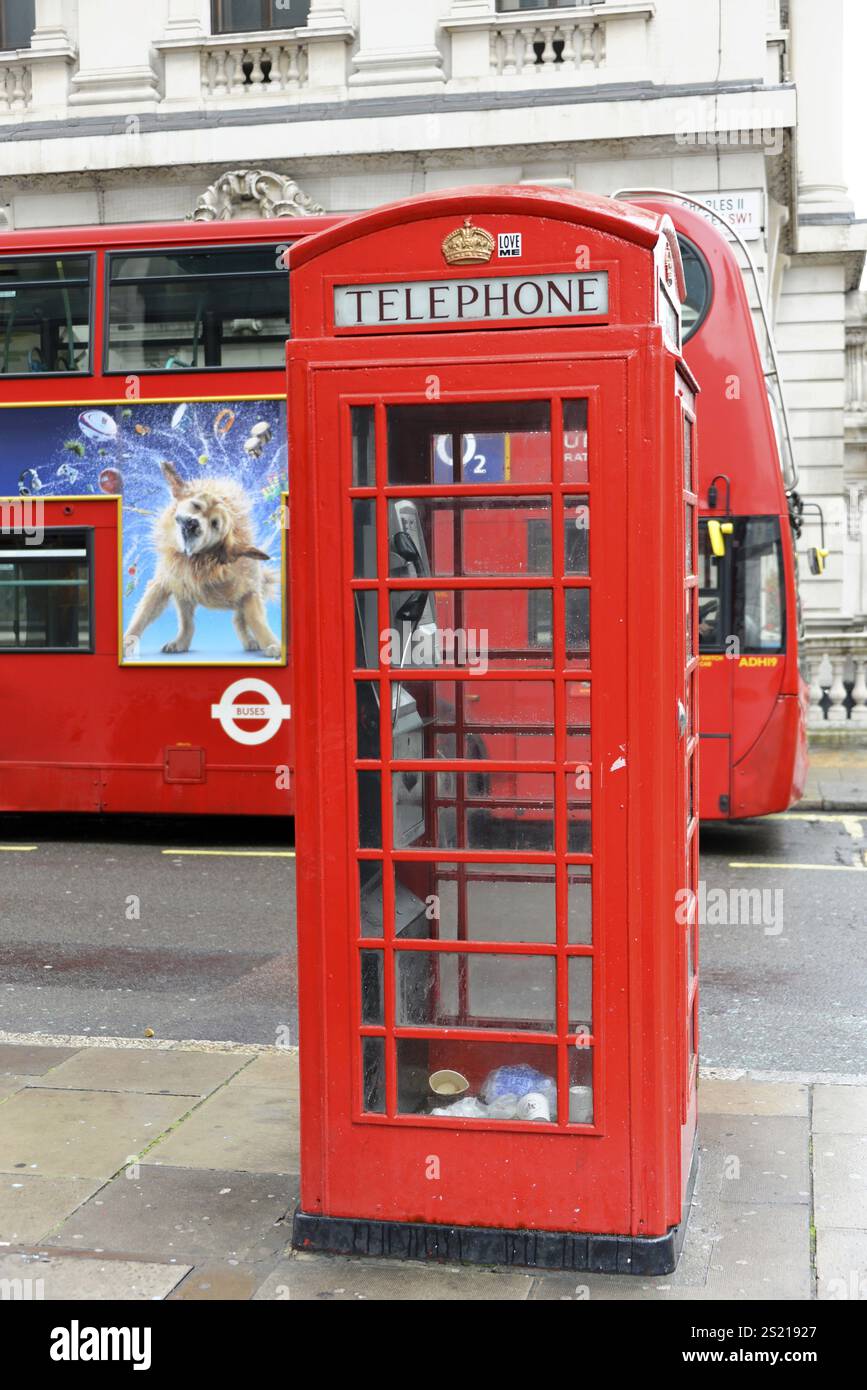 Red telephone box and double-decker bus in a London street, London ...