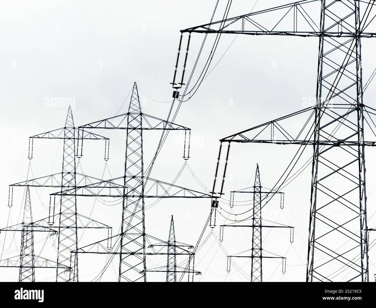 The pylons of a high-voltage power line. Power line transports electric ...