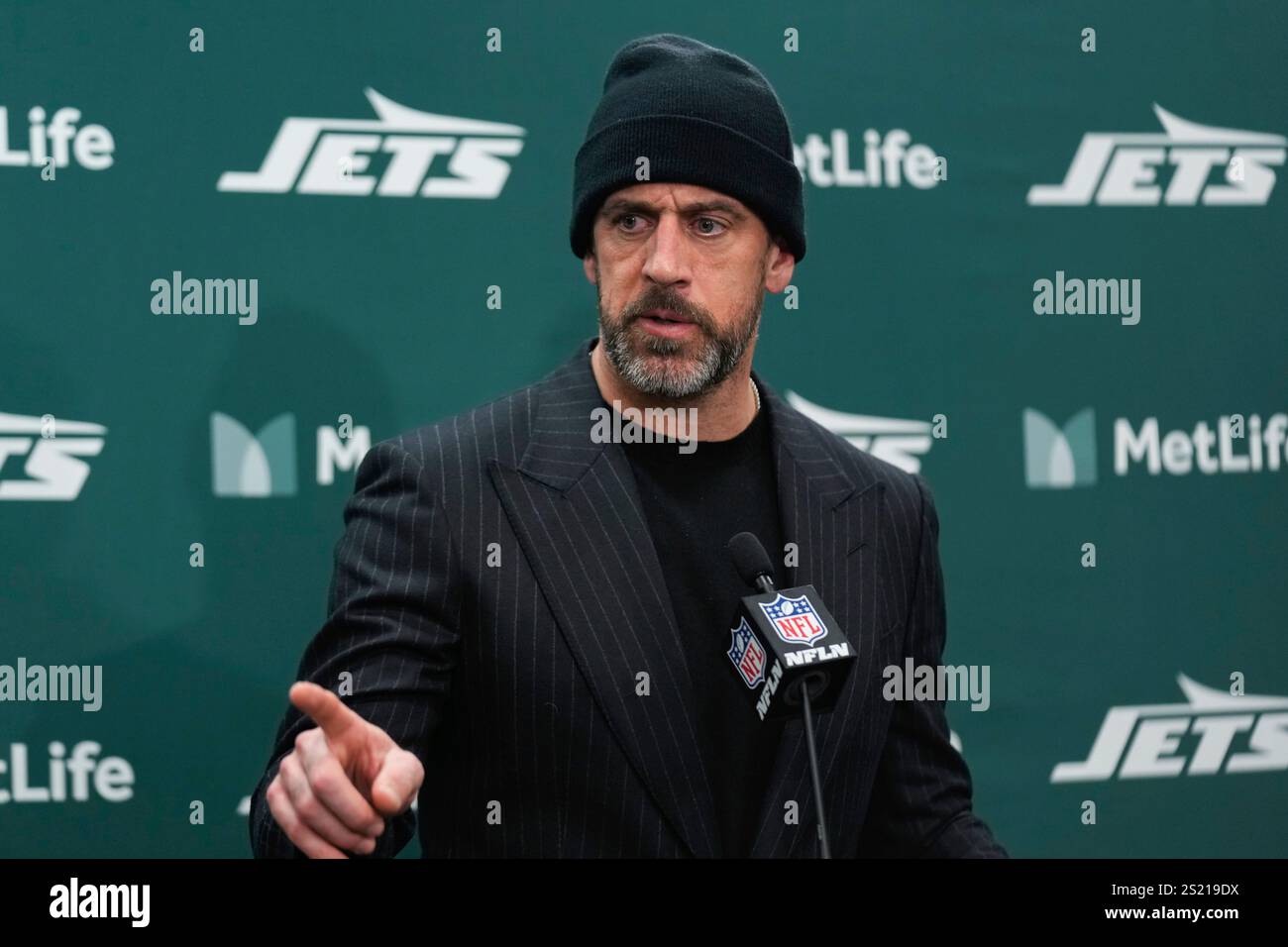 New York Jets quarterback Aaron Rodgers speaks at a news conference ...