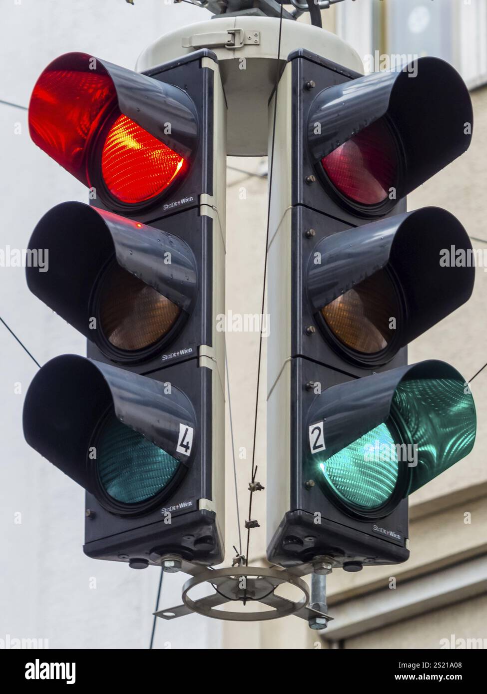 A traffic light with red and green light at an intersection Austria ...