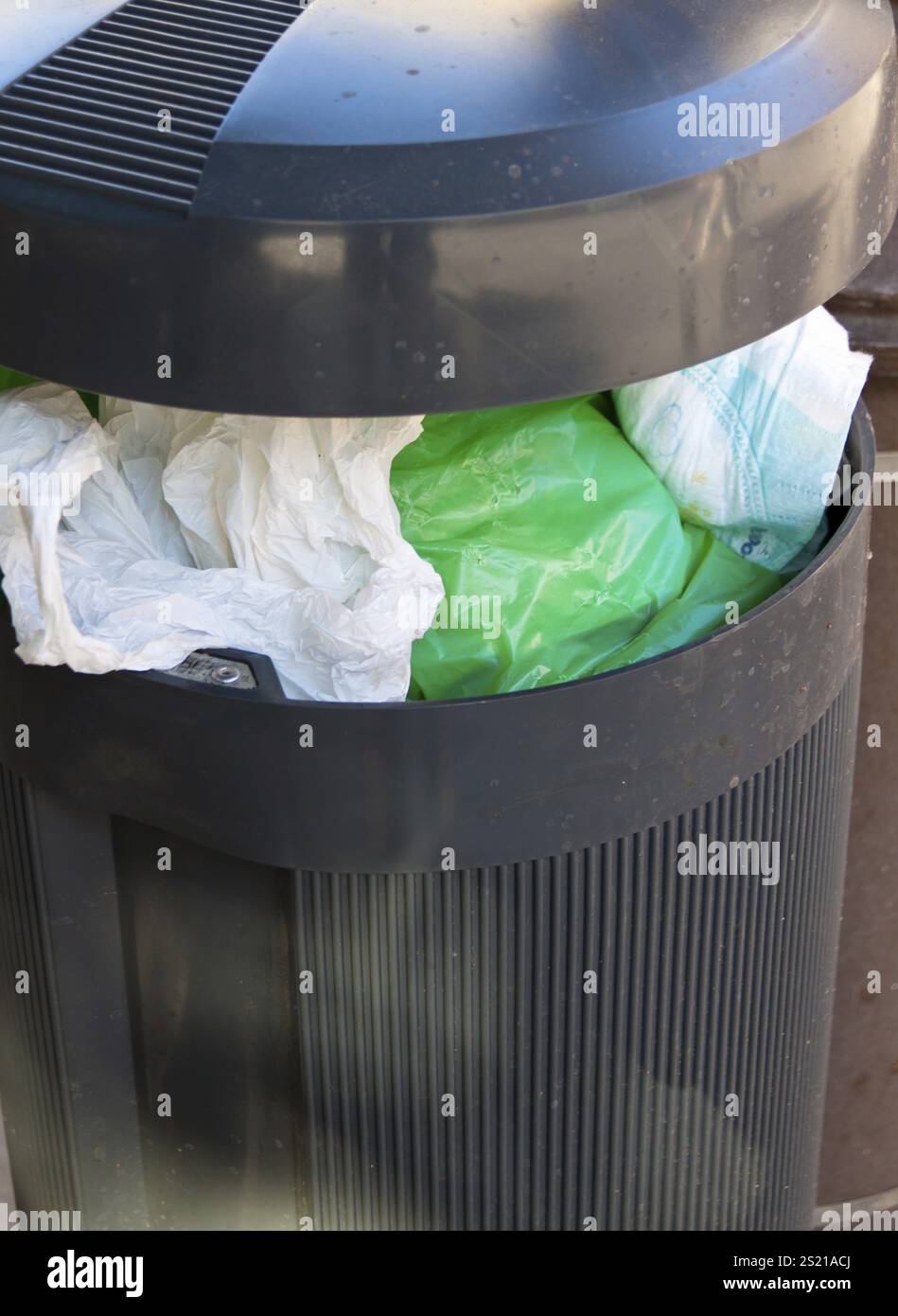 A litter bin full of plastic waste in a city in Austria Stock Photo - Alamy