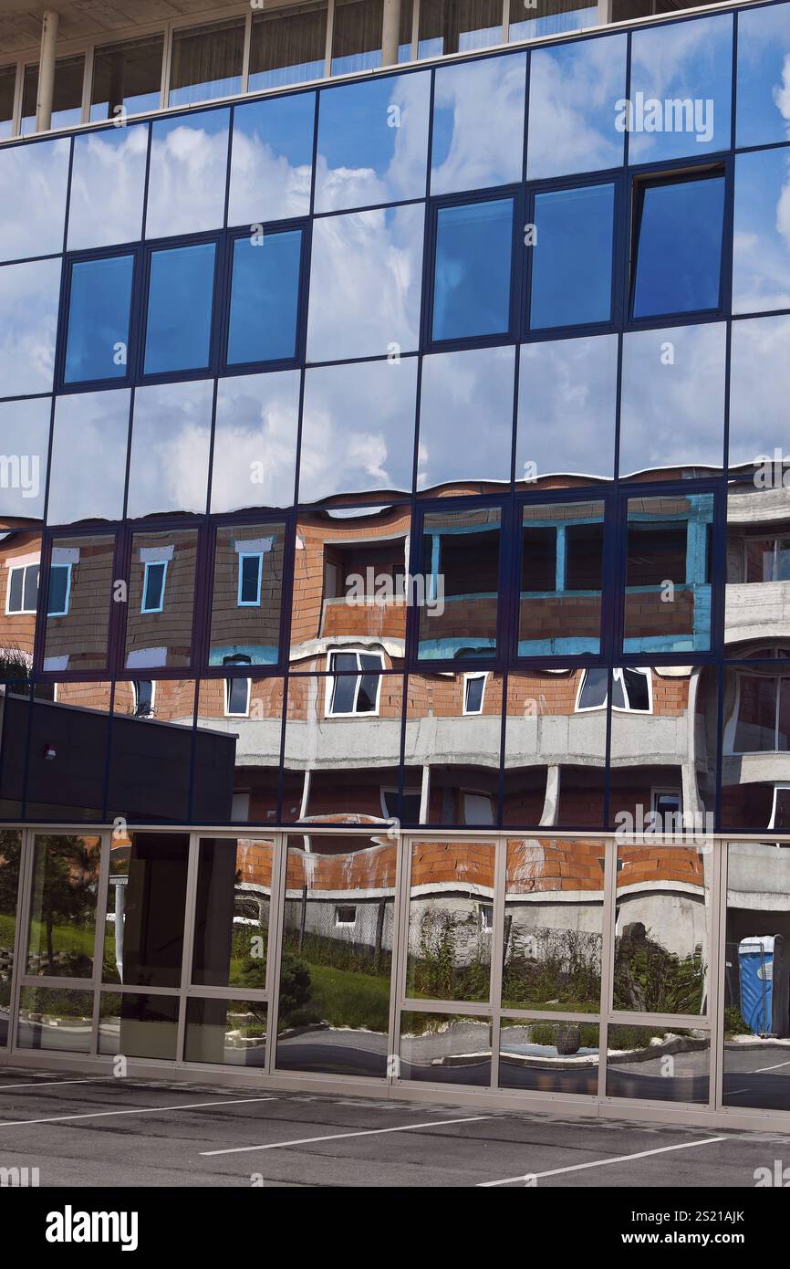 The shell of a residential building is reflected in the facade Austria ...