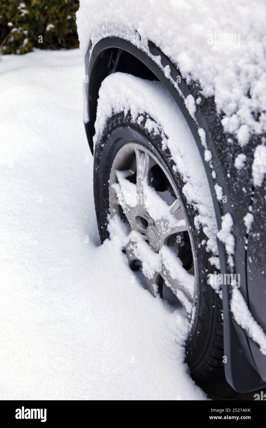 Winter tyres of a car in the snow. Driving in the winter, Winter tyres ...