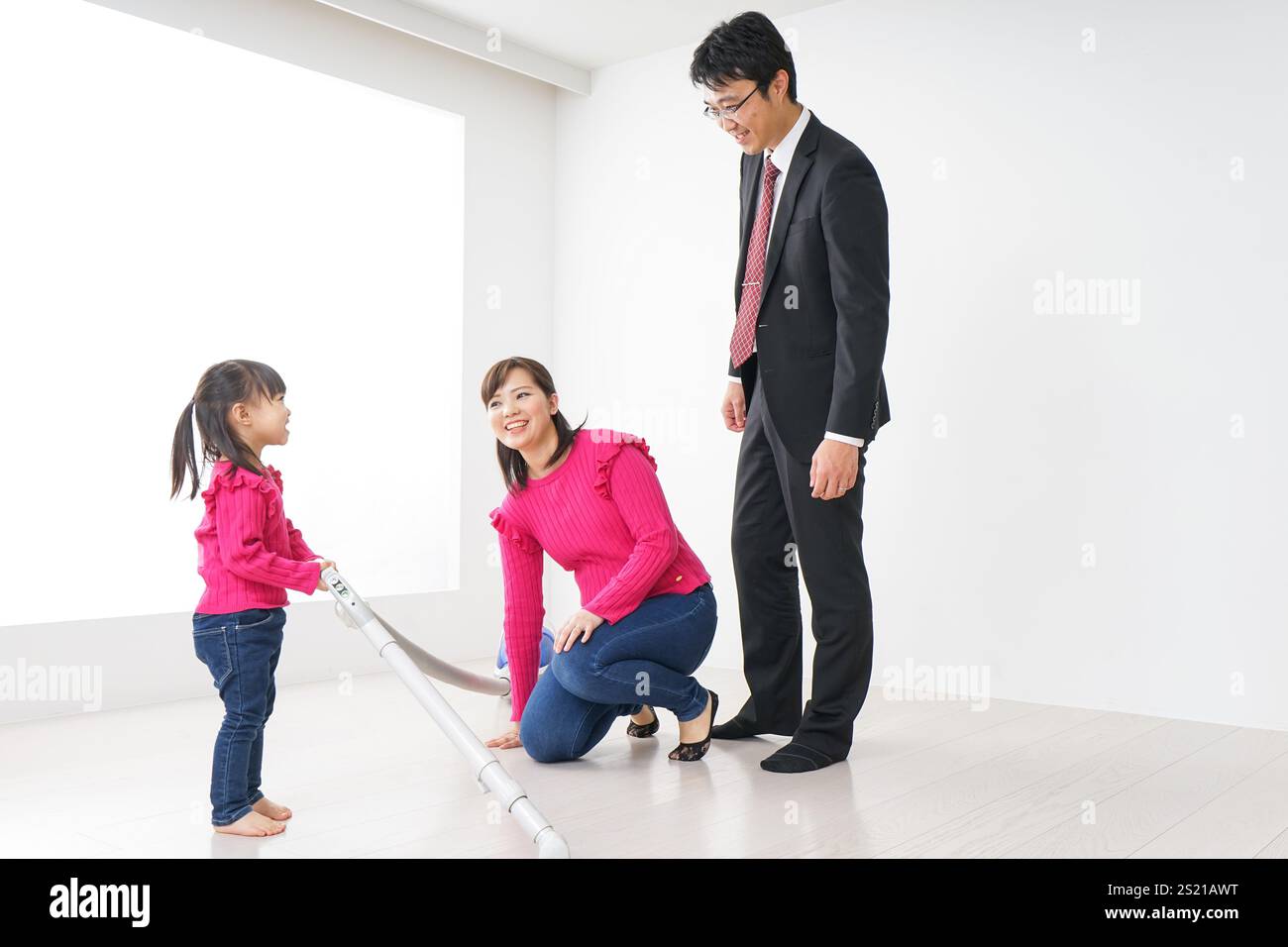 Father and mother and daughter going to work Stock Photo - Alamy