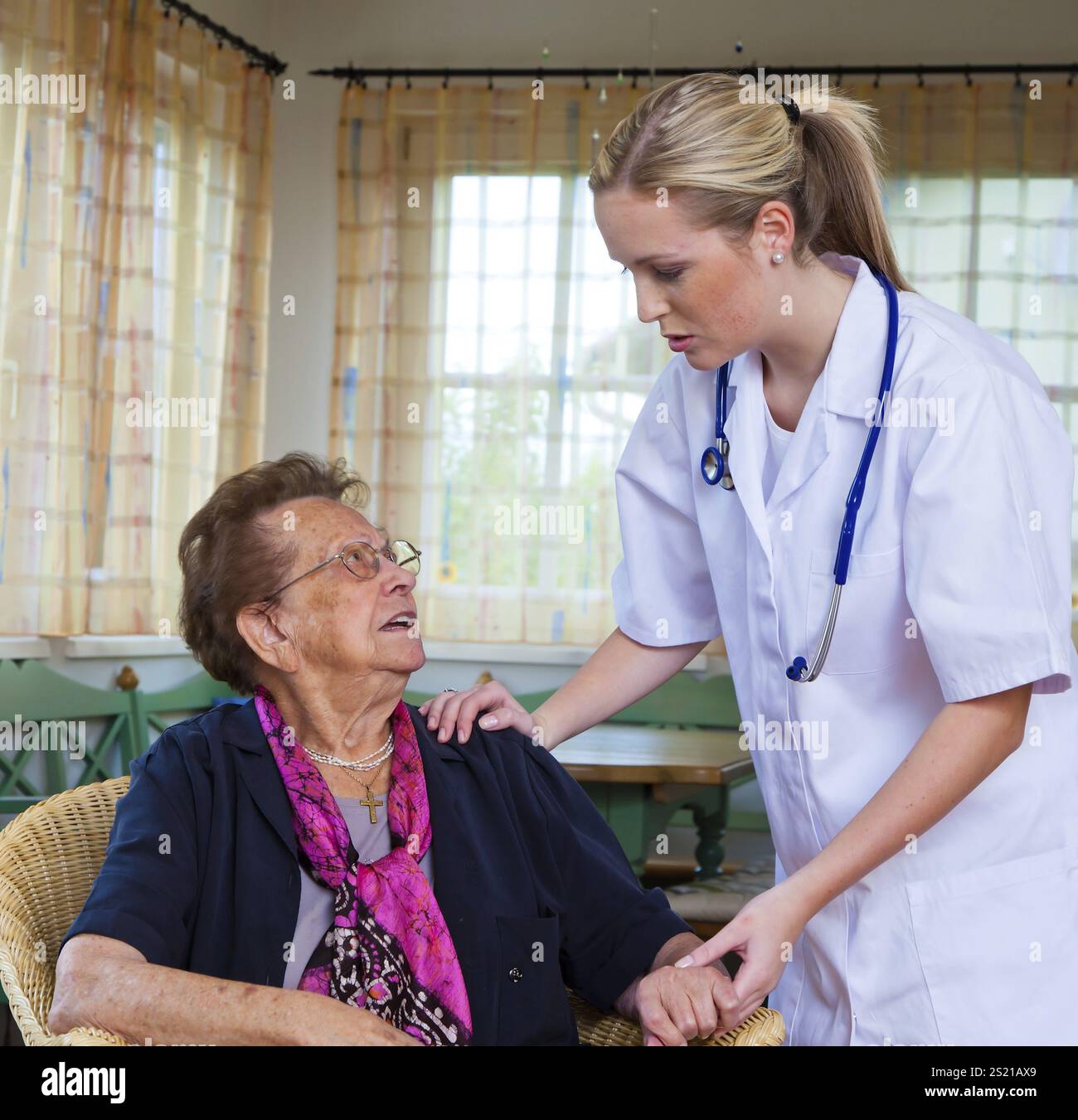 The doctor visits a sick old lady. Home visit and ward round Austria ...