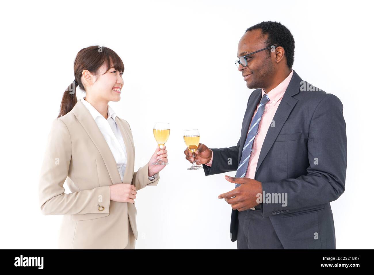 Business people drinking alcohol Stock Photo - Alamy