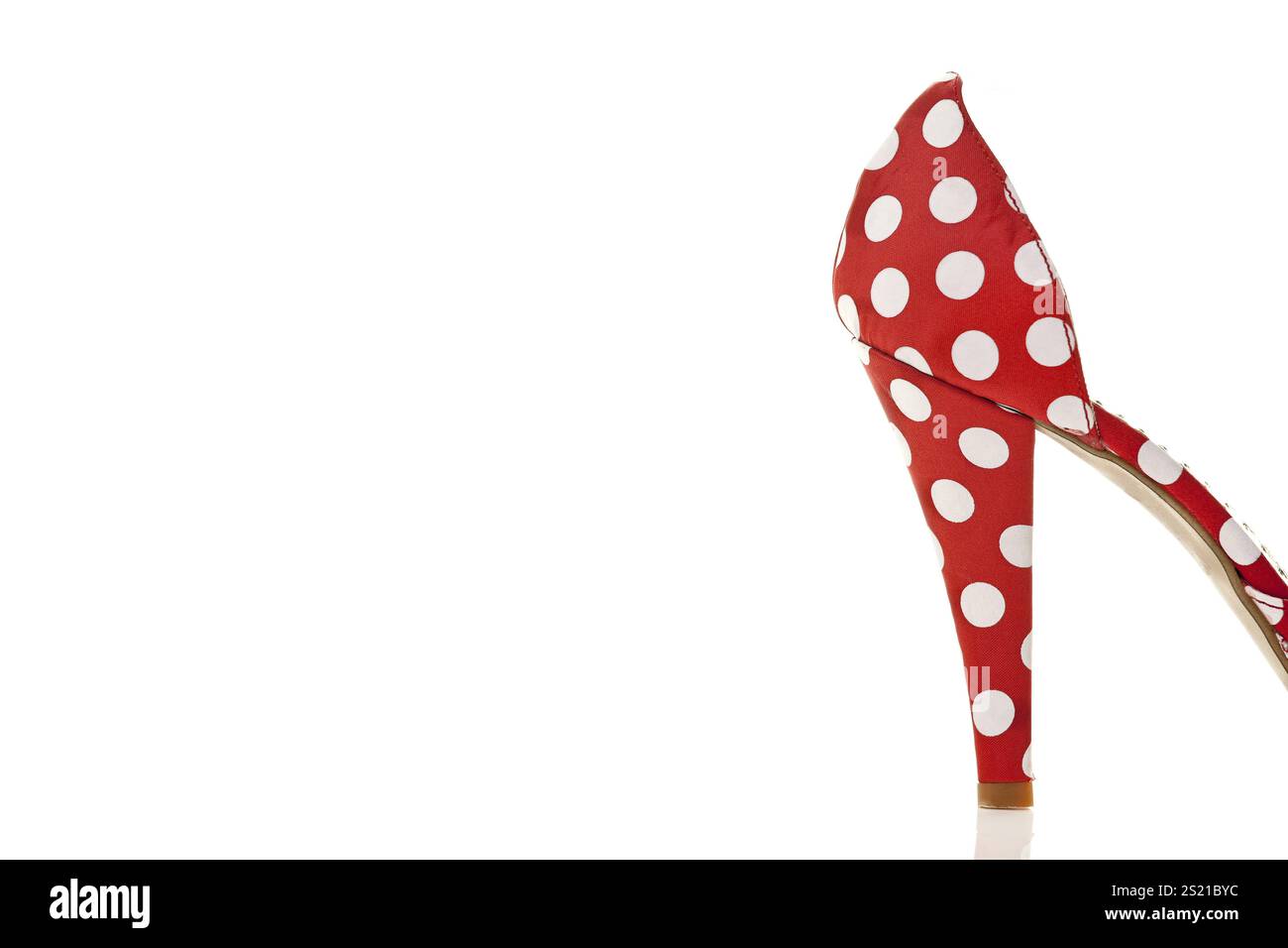 Red ladies shoes high heels with white dots Stock Photo - Alamy