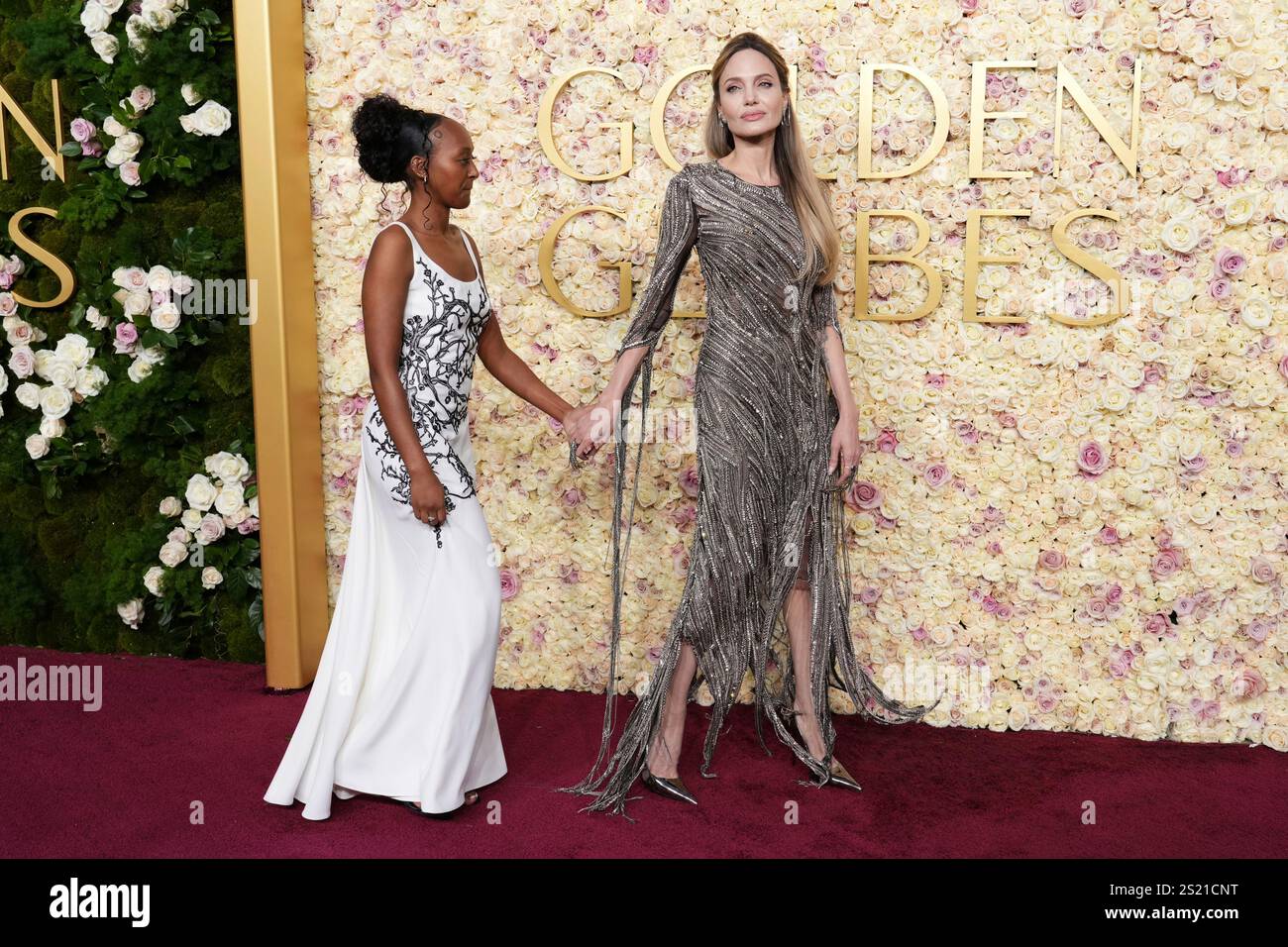 Zahara Jolie Left And Angelina Jolie Arrive At The 82nd Golden Globes