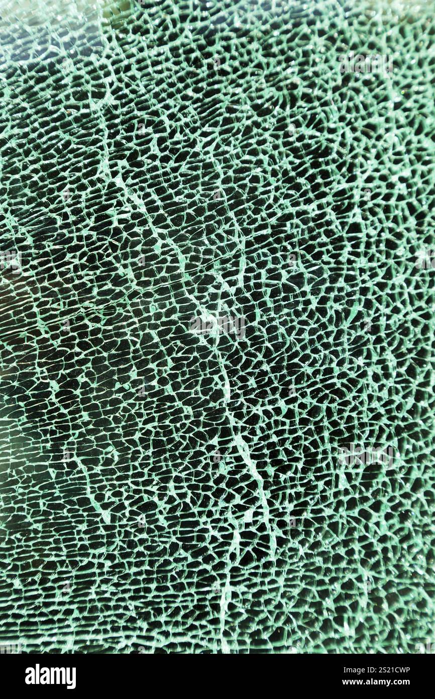 The side window of a car is shattered. Safety glass Austria Stock Photo ...