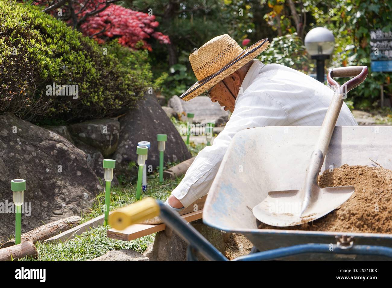 Elderly man doing civil engineering work Stock Photo - Alamy