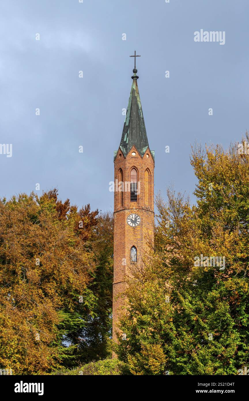 Old church tower on the Isle of Ruegen in Germany surrounded by ...