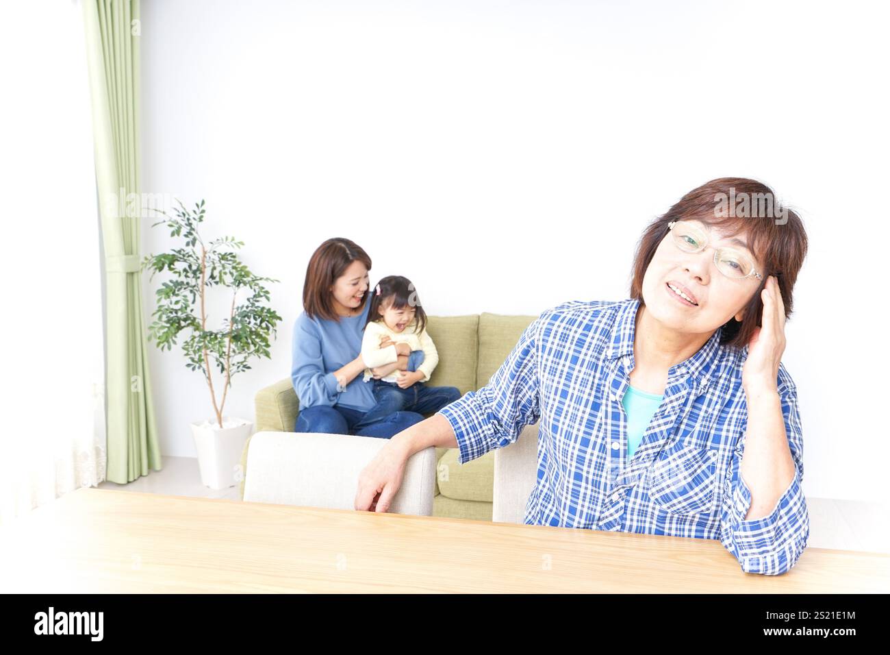 Family returning with their children to their hometown Stock Photo - Alamy