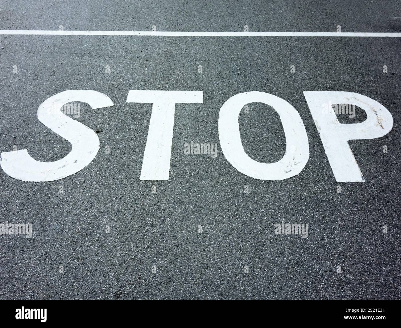 The sign Stop on a road Stop in front of a junction because of stop ...
