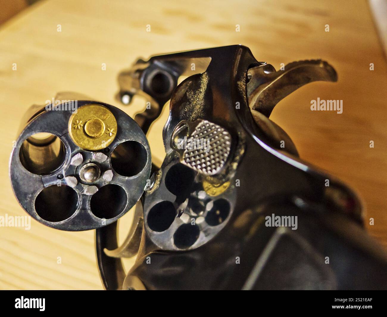A revolver with a single cartridge. Symbolic photo for Russian roulette ...