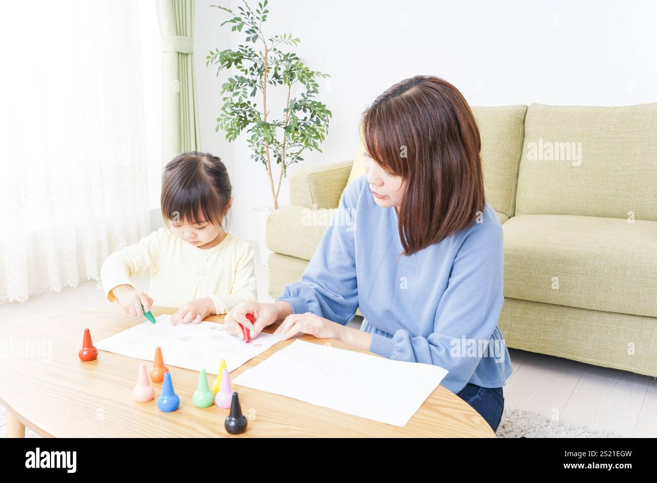 Parent and child drawing Stock Photo - Alamy