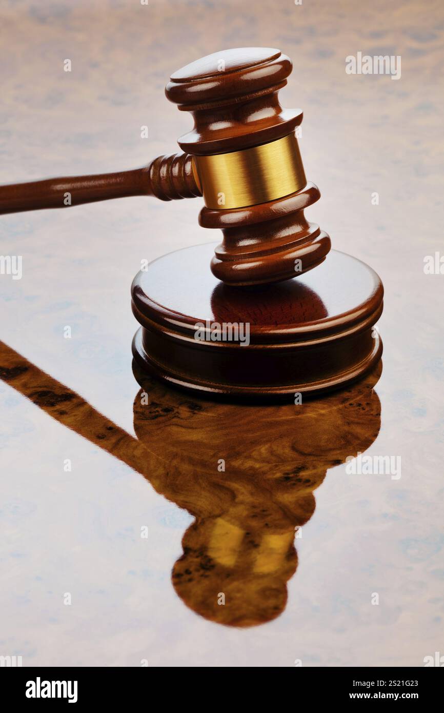 The gavel of a judge in court. Lying on a desk. Austria Stock Photo - Alamy