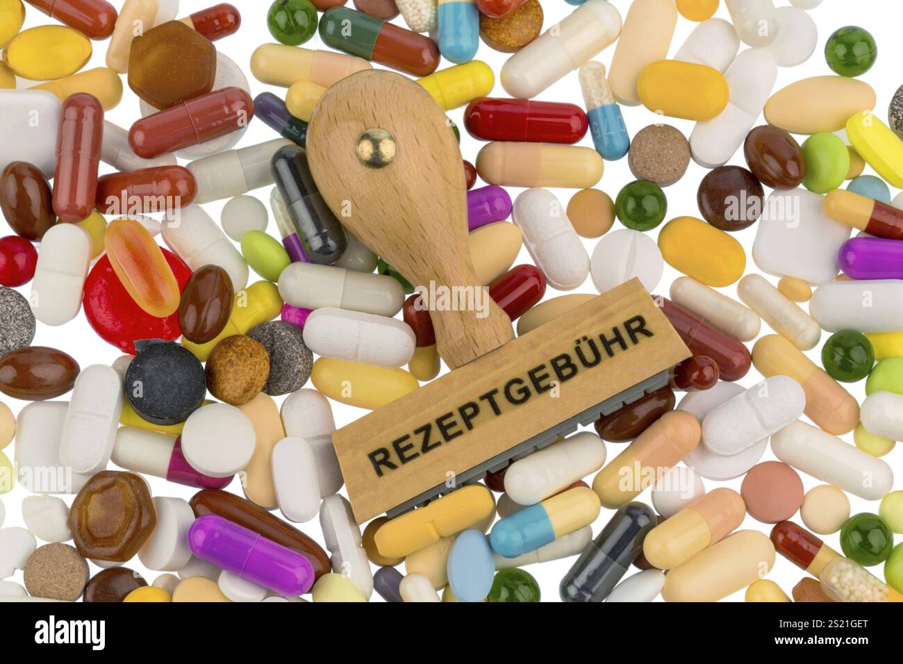 Stamp on coloured tablets, symbol photo for medication, prescription ...