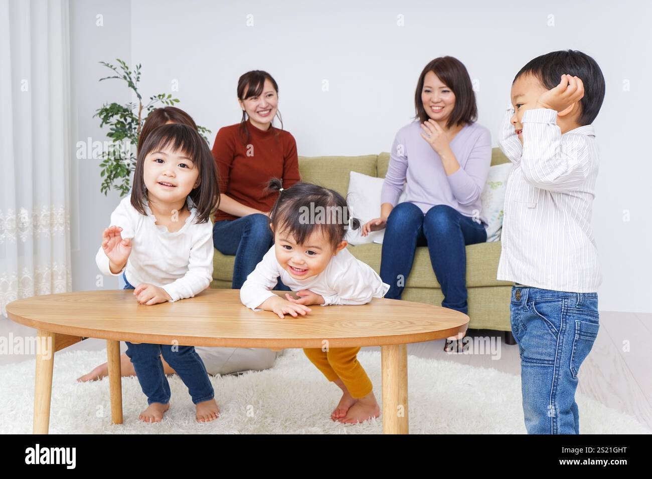 Mother and children Stock Photo - Alamy