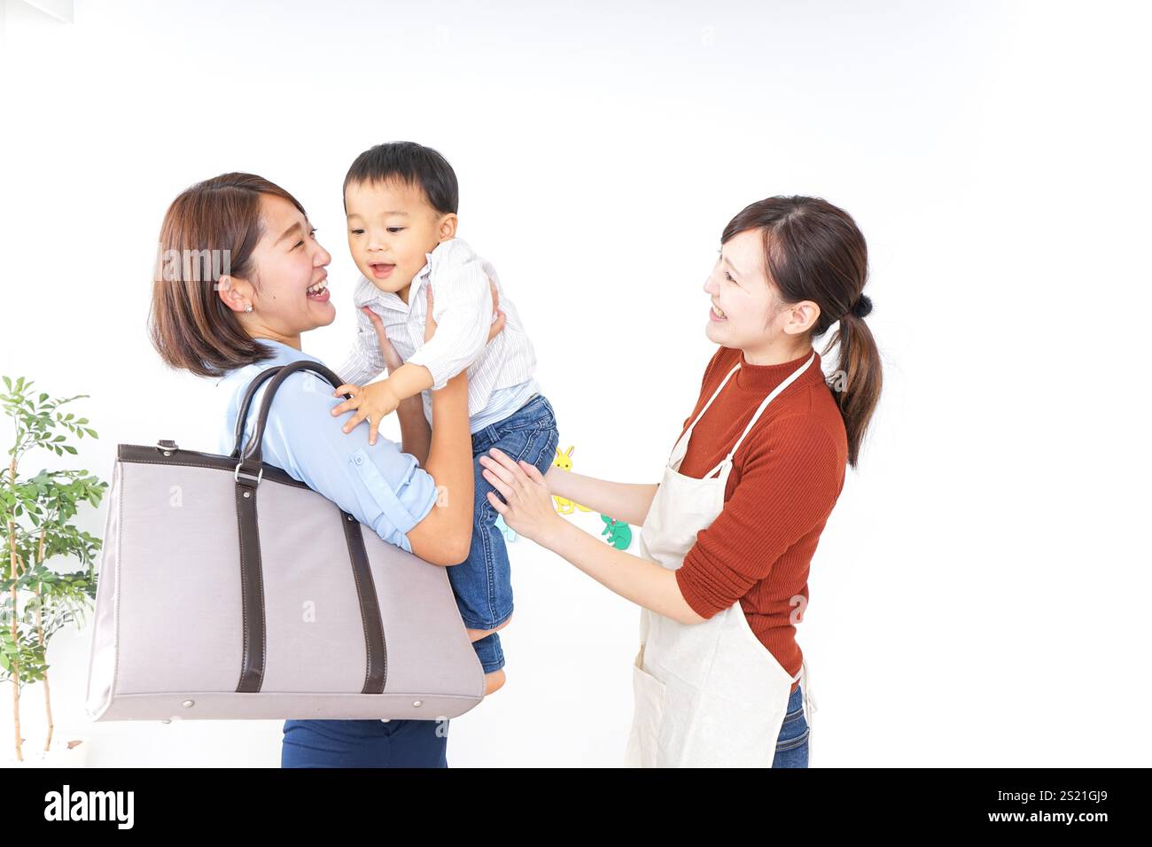 Mother picking up her child from kindergarten Stock Photo - Alamy