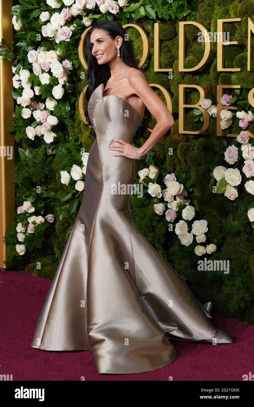 Demi Moore arrives at the 82nd Golden Globes on Sunday, Jan. 5, 2025 ...