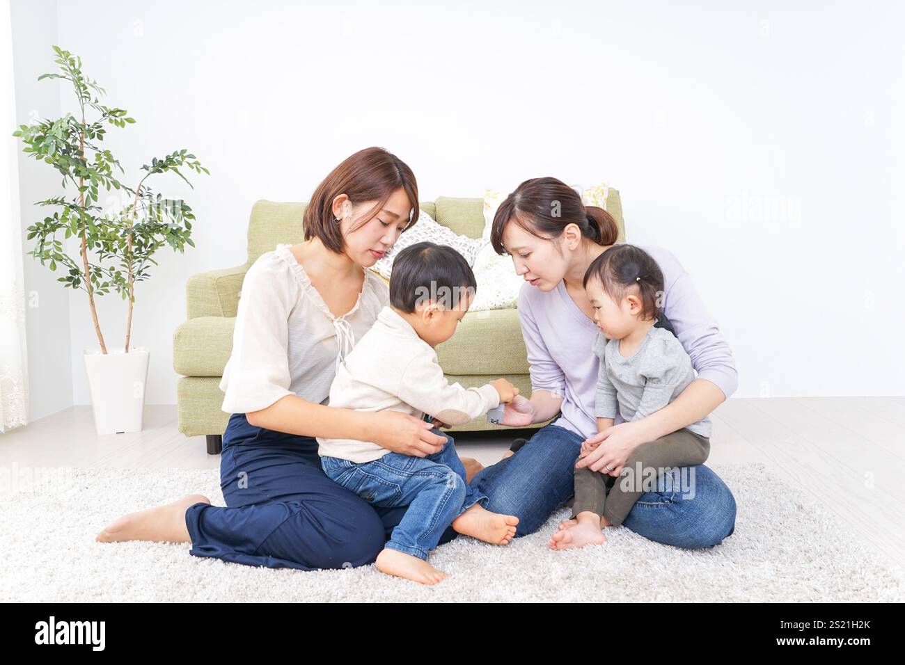 Childhood friend and mother friend Stock Photo - Alamy