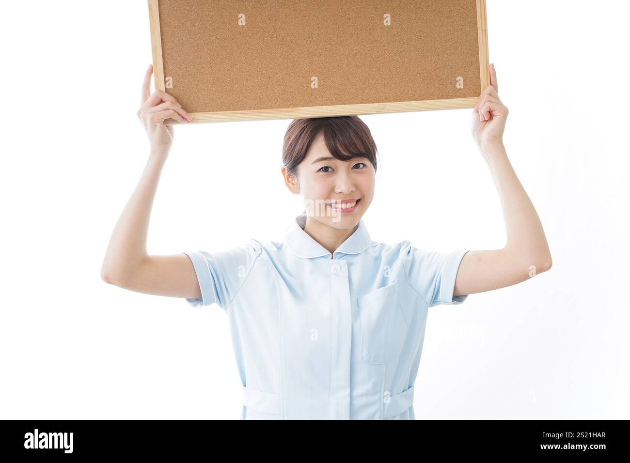 Nurse holding board Stock Photo - Alamy