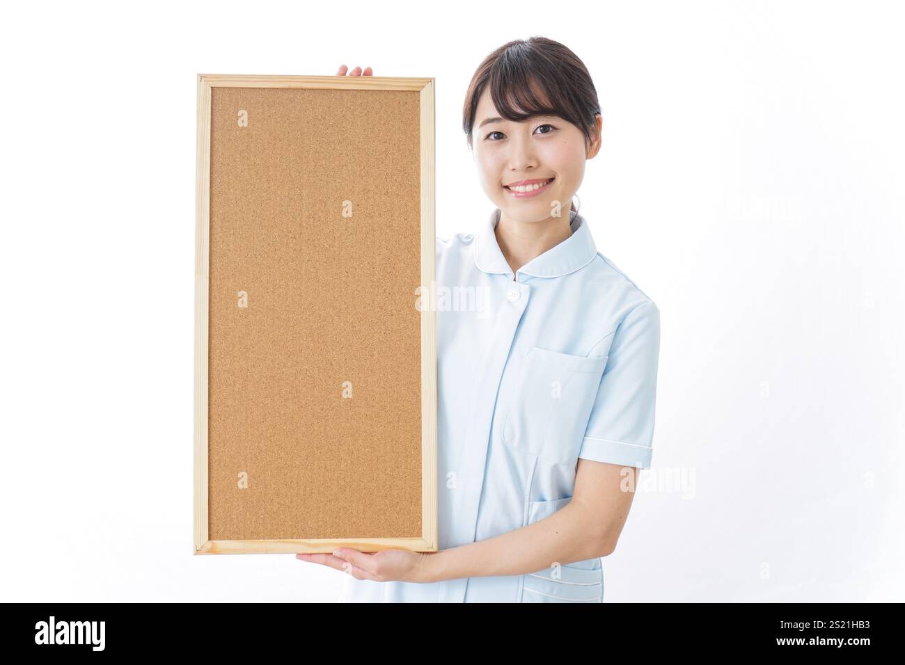 Nurse holding board Stock Photo - Alamy