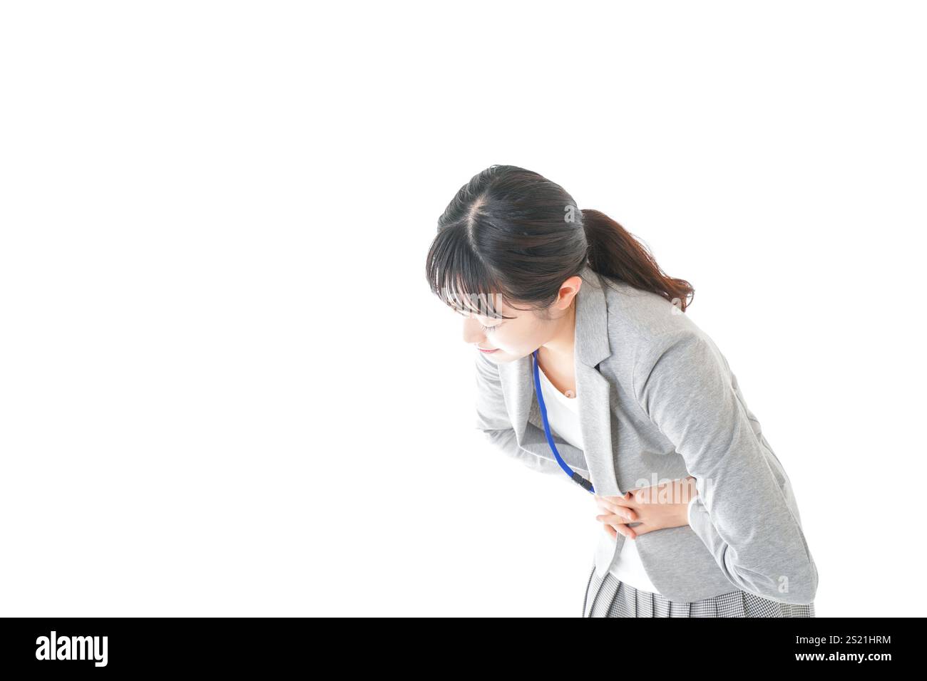 Young career women suffering from abdominal pain Stock Photo - Alamy