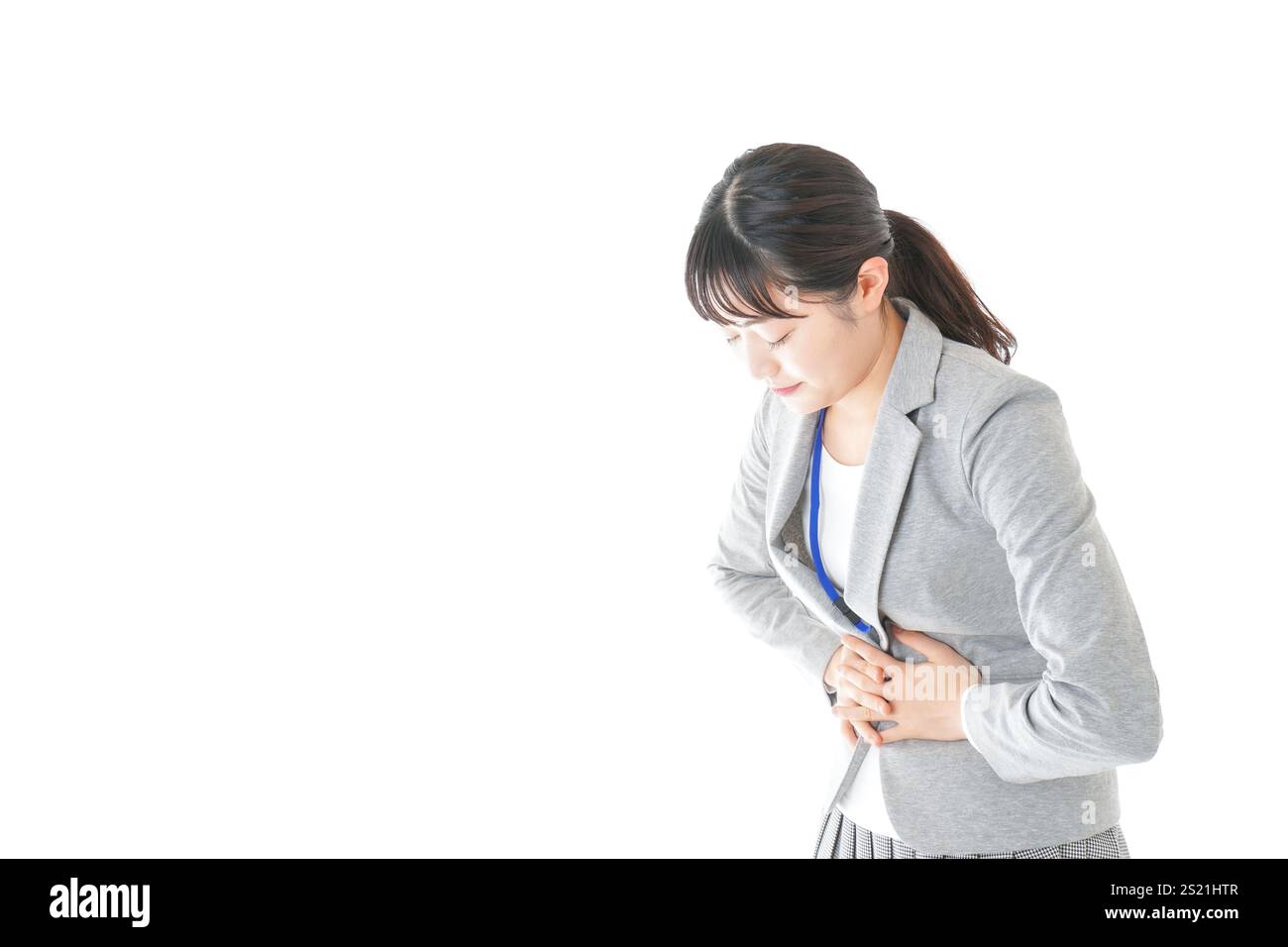 Young career women suffering from abdominal pain Stock Photo - Alamy