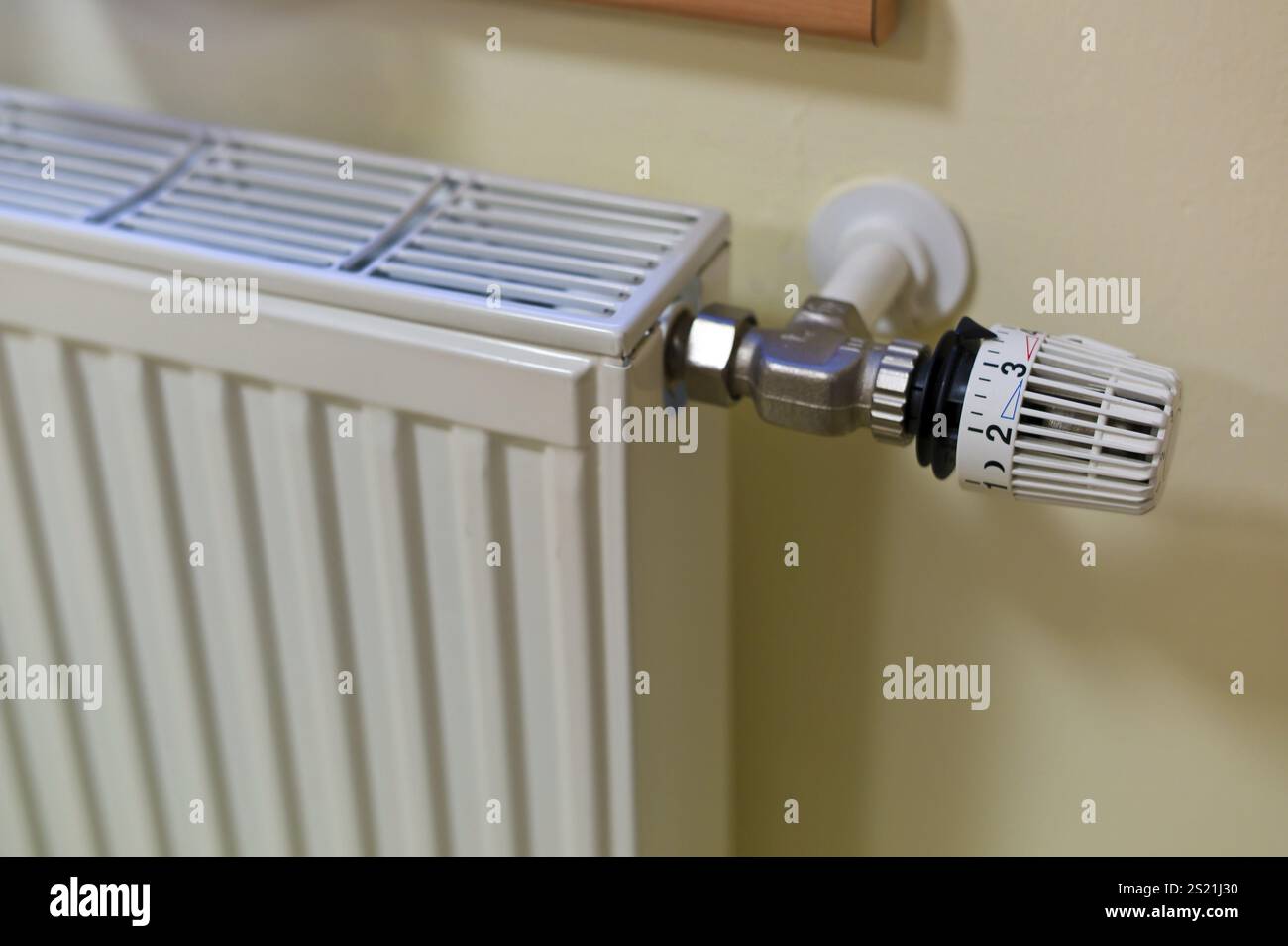 The thermostat of a radiator in a flat Austria Stock Photo - Alamy