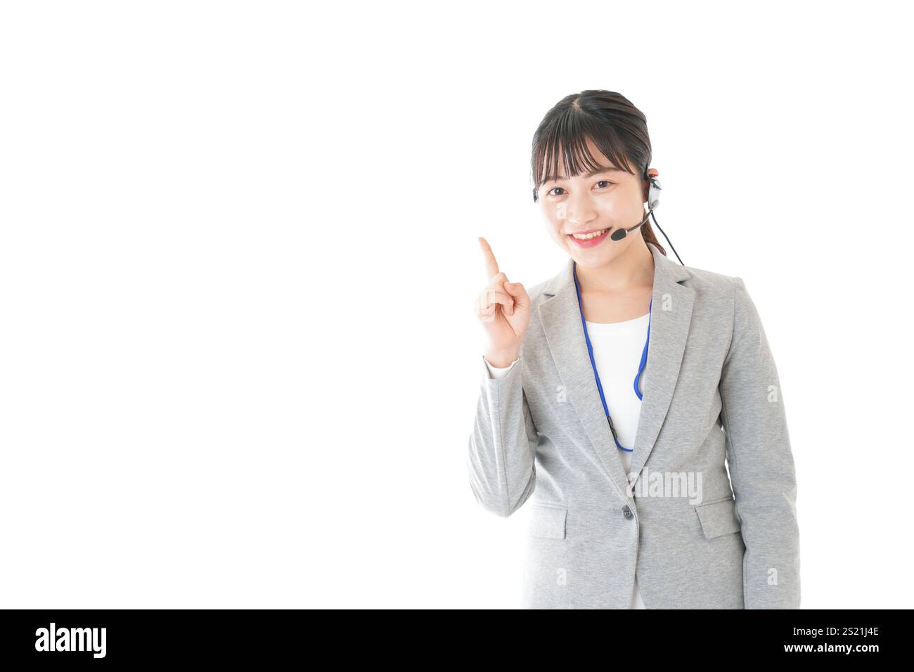 Call centre woman pointing fingers Stock Photo - Alamy