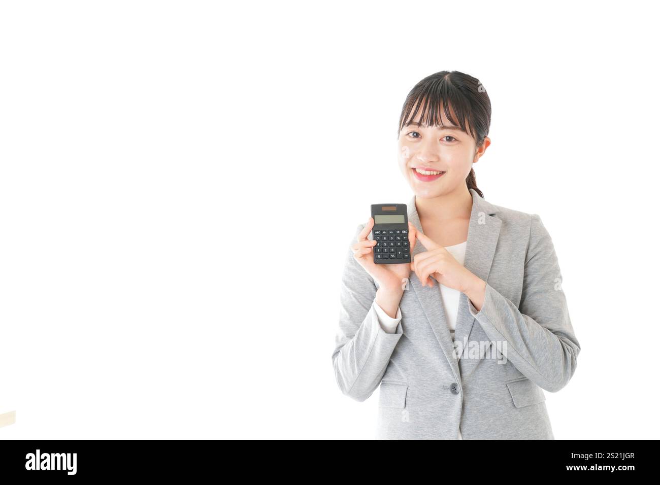 Doing calculation on calculator hi-res stock photography and images - Alamy