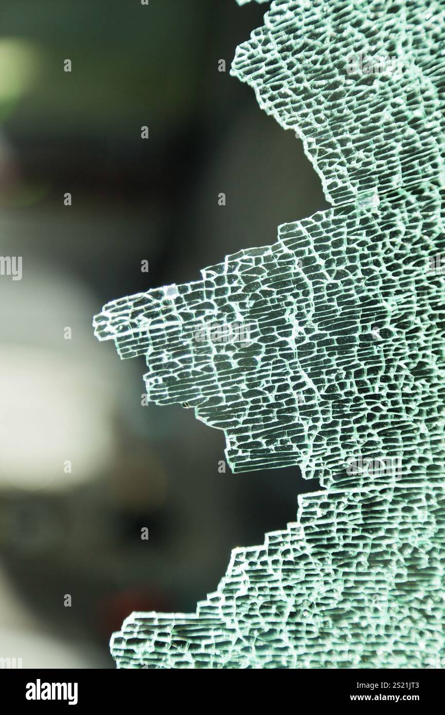 The side window of a car is shattered. Safety glass Austria Stock Photo ...