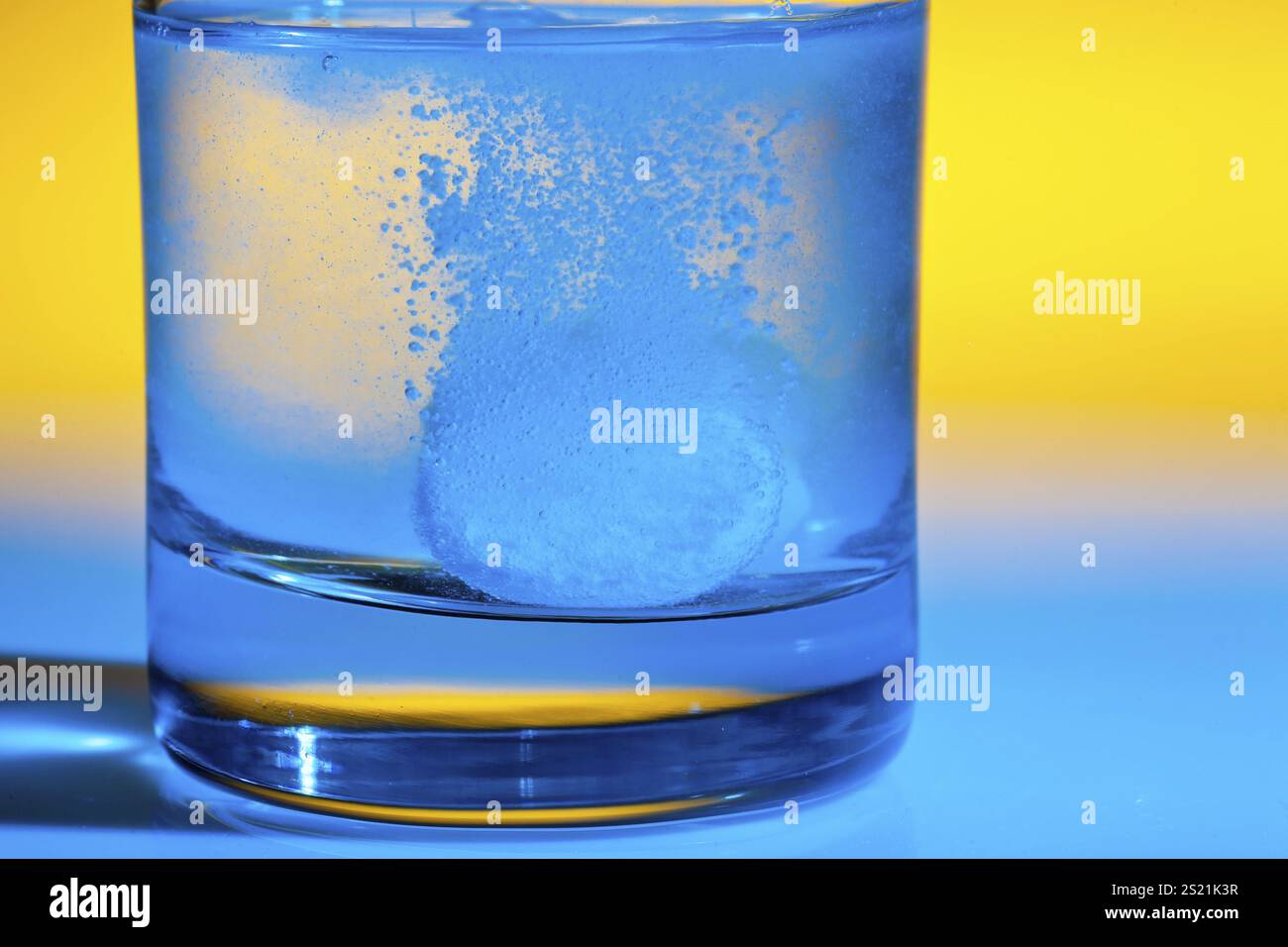 One effervescent tablet dissolves in a glass of water Austria Stock ...