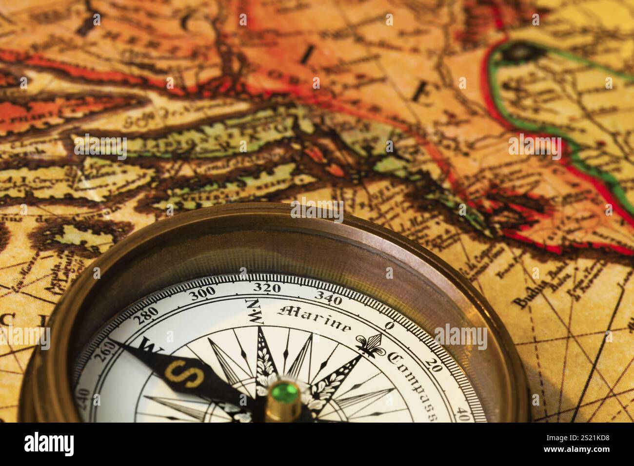 An old compass lies on a map of Austria Stock Photo - Alamy
