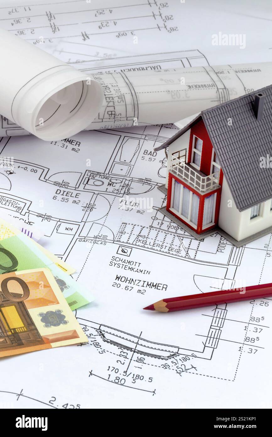 An architect's construction plan with euro money. Symbolic photo for ...