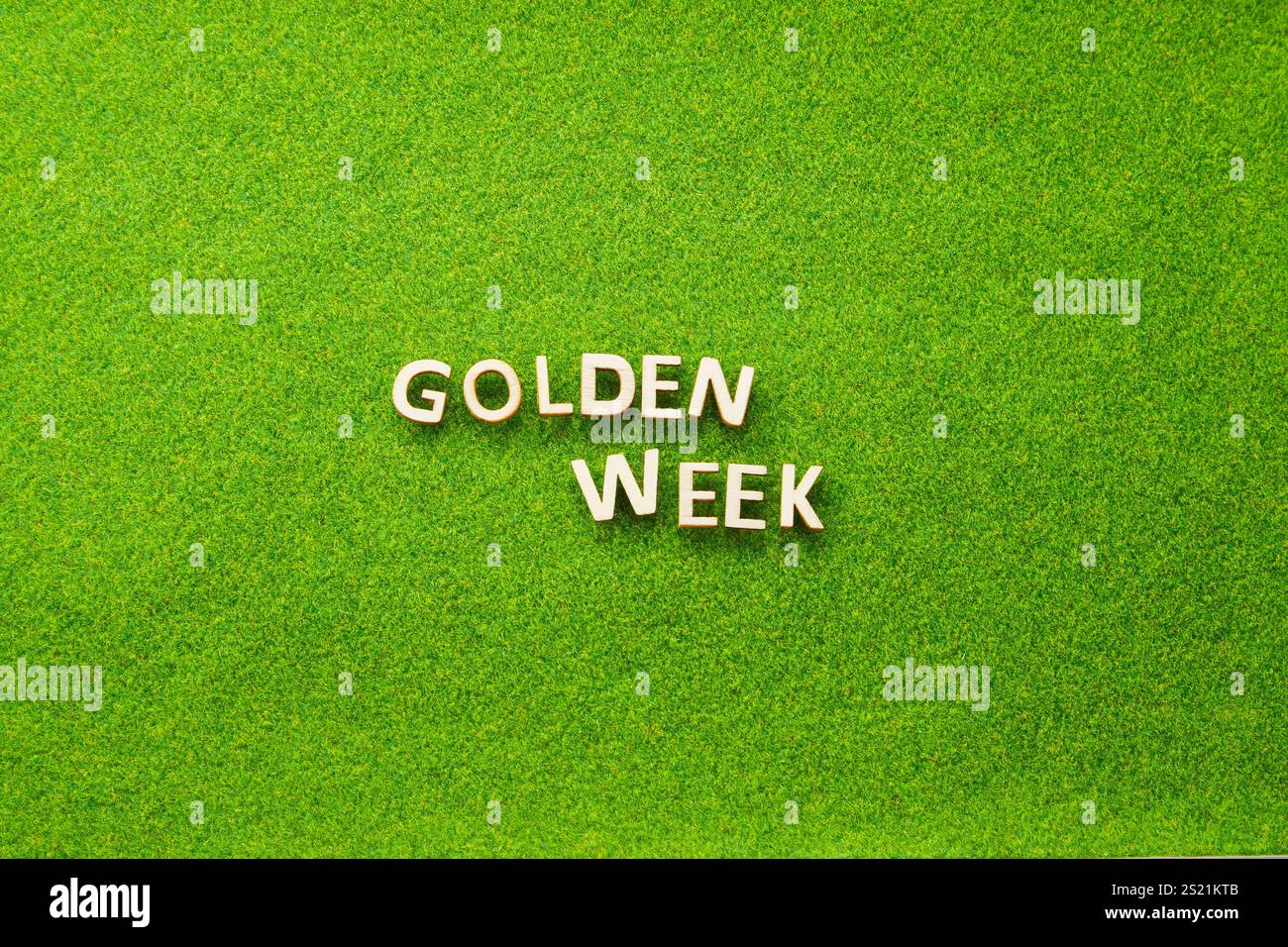 GOLDEN WEEK White wood lawn Stock Photo - Alamy